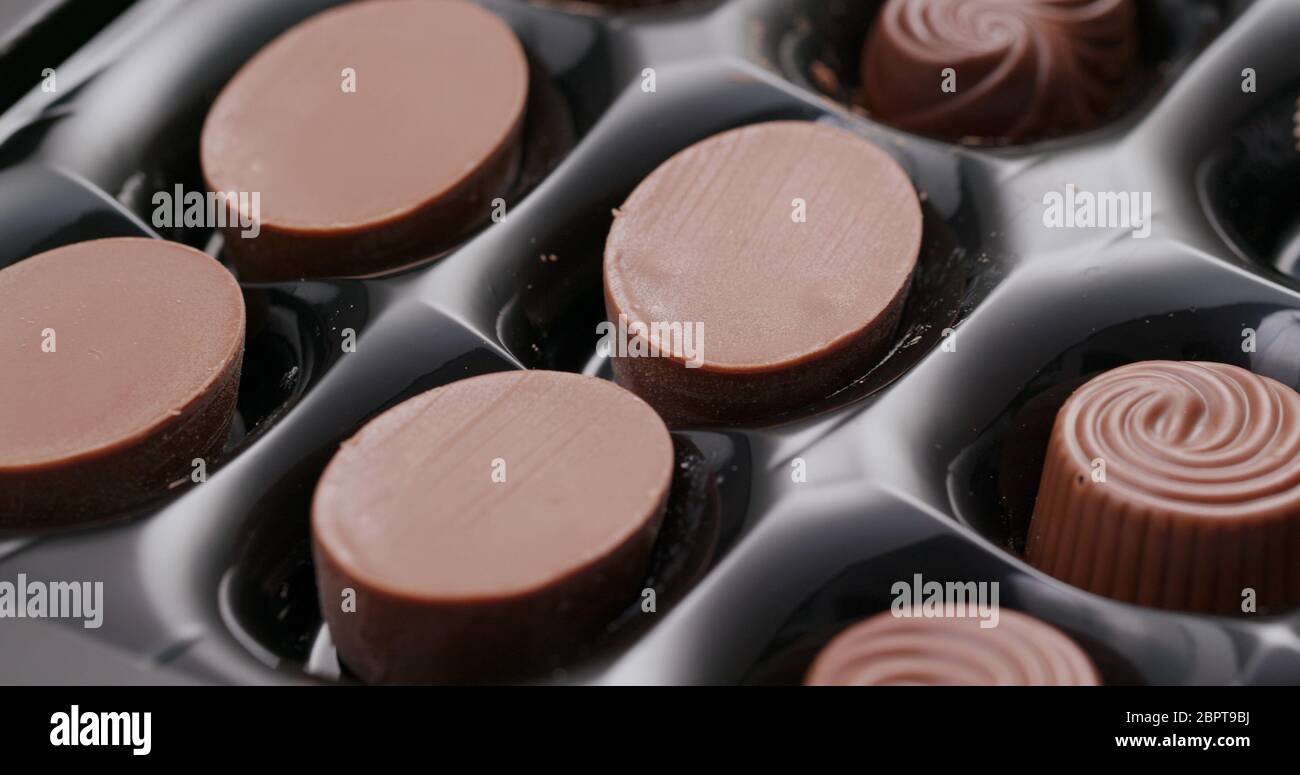 Mixed chocolate in box Stock Photo - Alamy