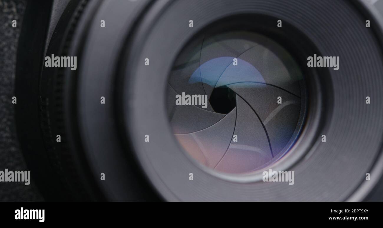 Changing the lens hi-res stock photography and images - Alamy