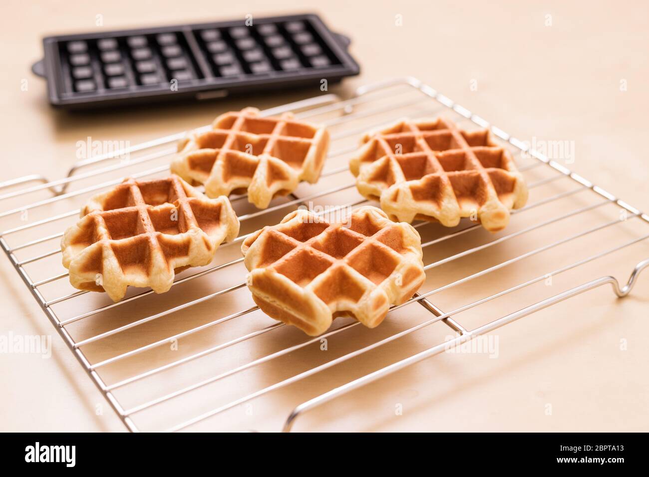 Making waffle at home Stock Photo - Alamy