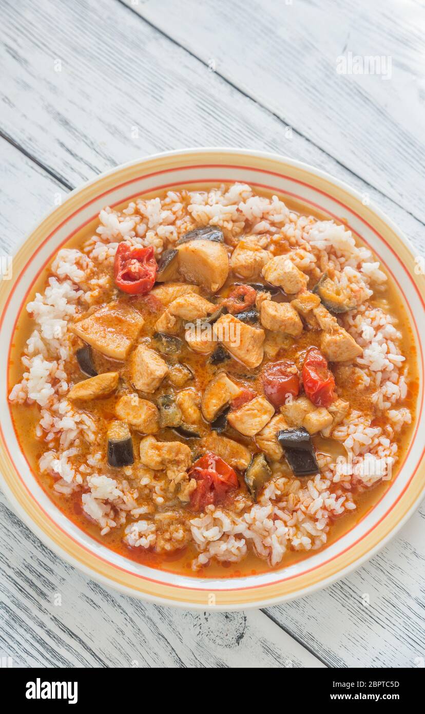 Thai red chicken curry with white rice Stock Photo - Alamy