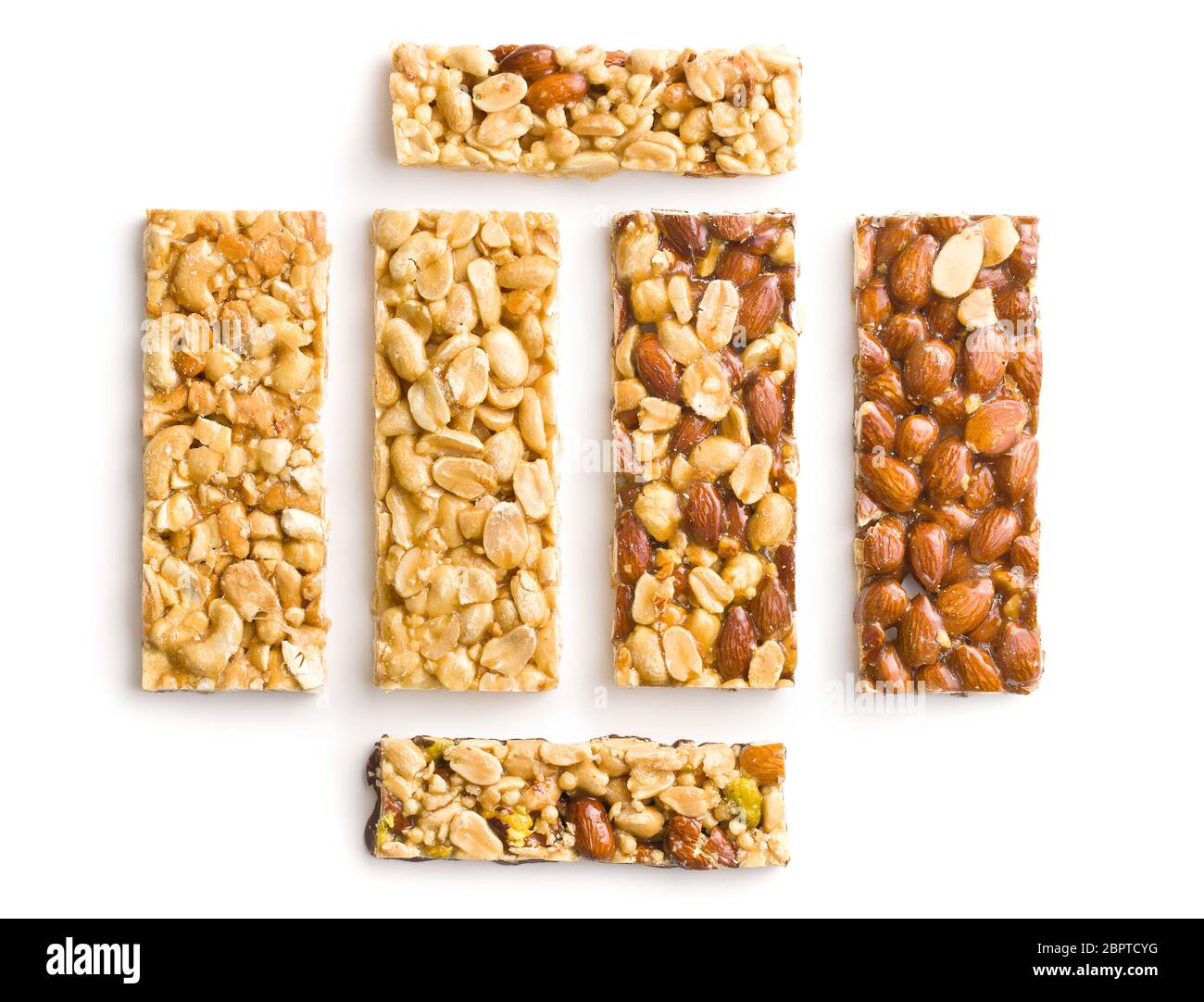 Sweet nut bars with honey isolated on white background Stock Photo - Alamy