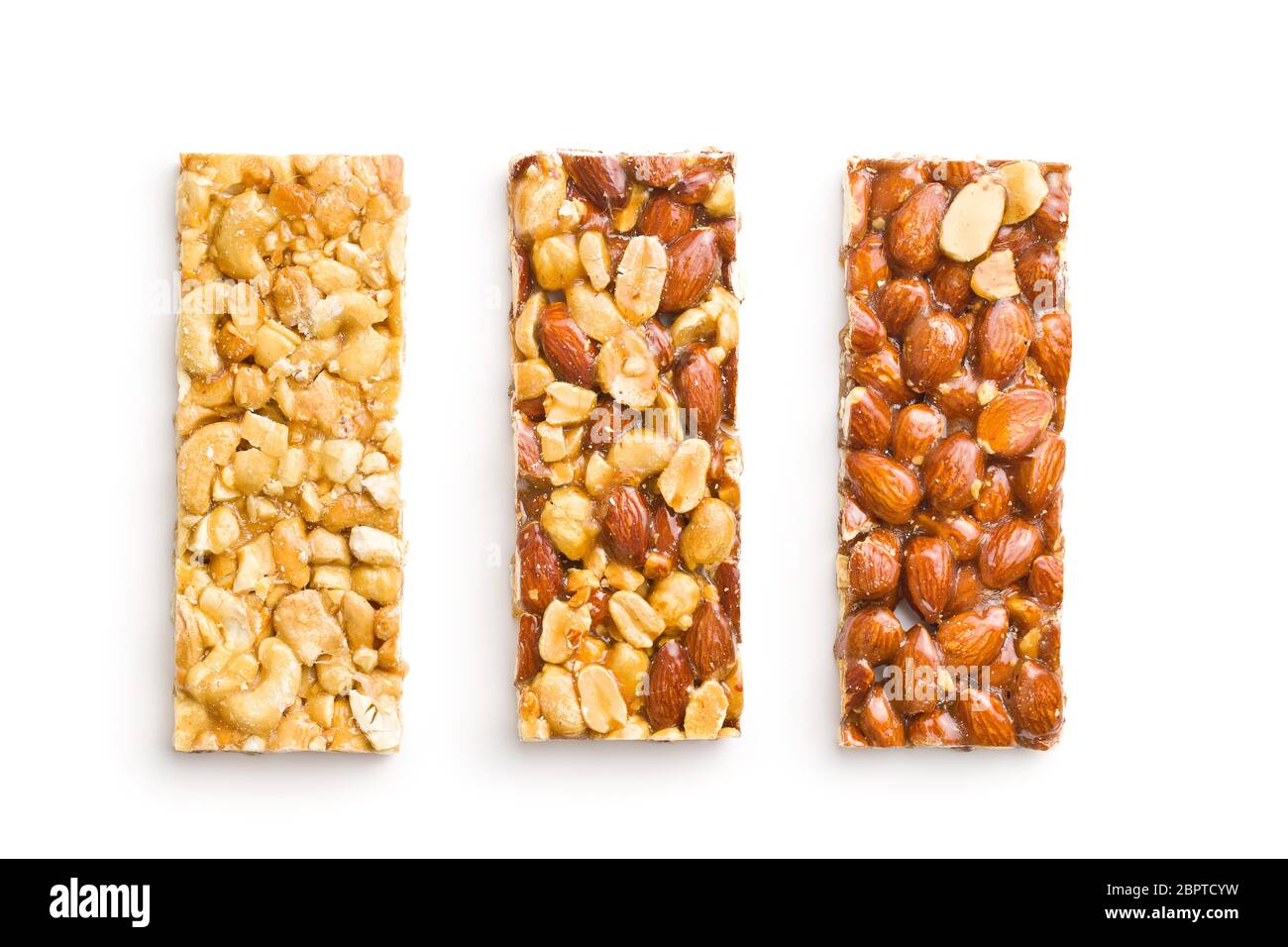 Sweet nut bars with honey isolated on white background Stock Photo - Alamy