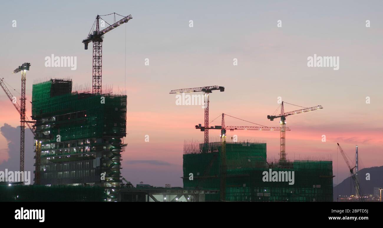 Construction site sunset Stock Photo - Alamy