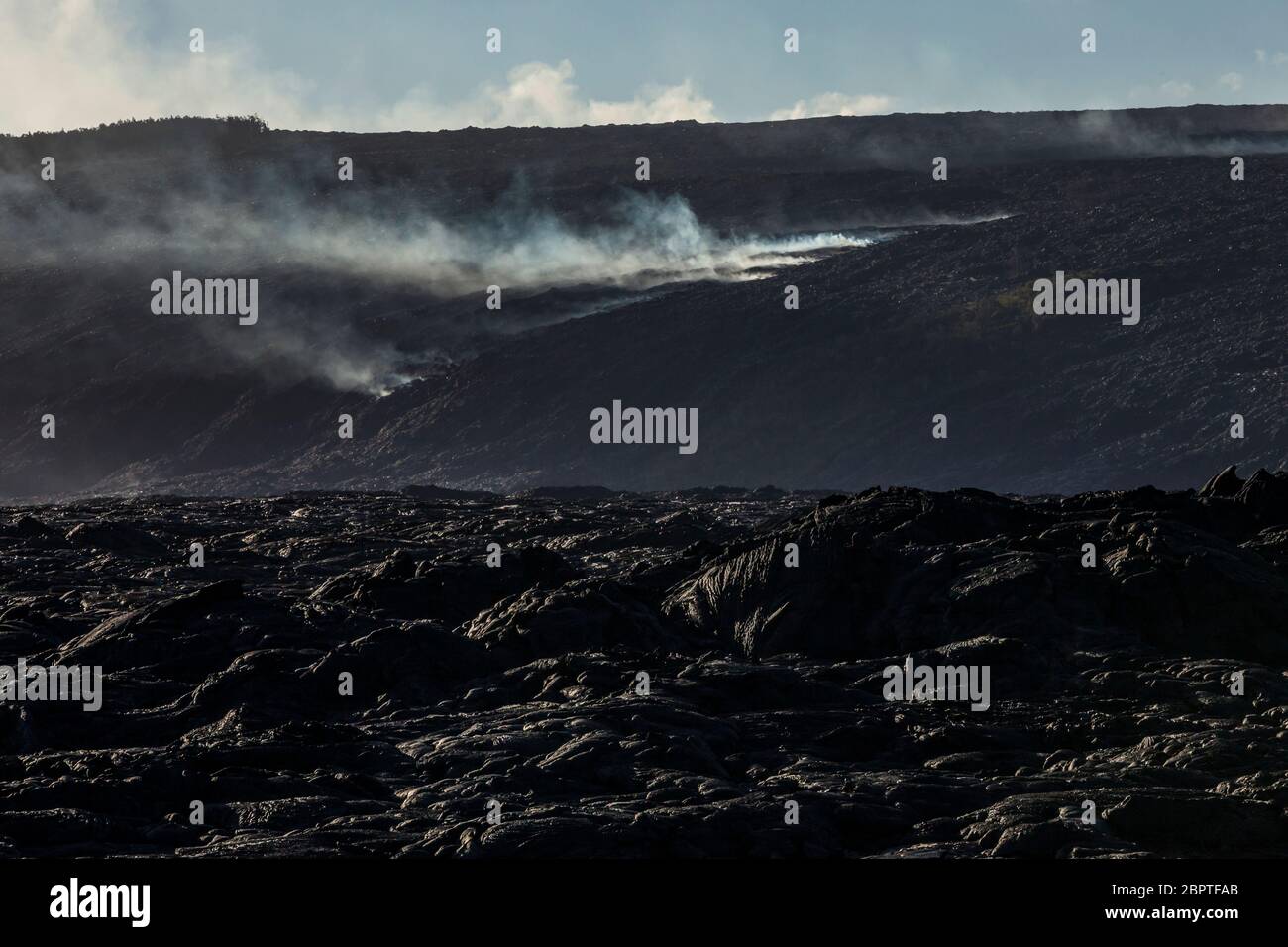 Steam and gas seep up from volcanic activity below on the Eastern Rift ...
