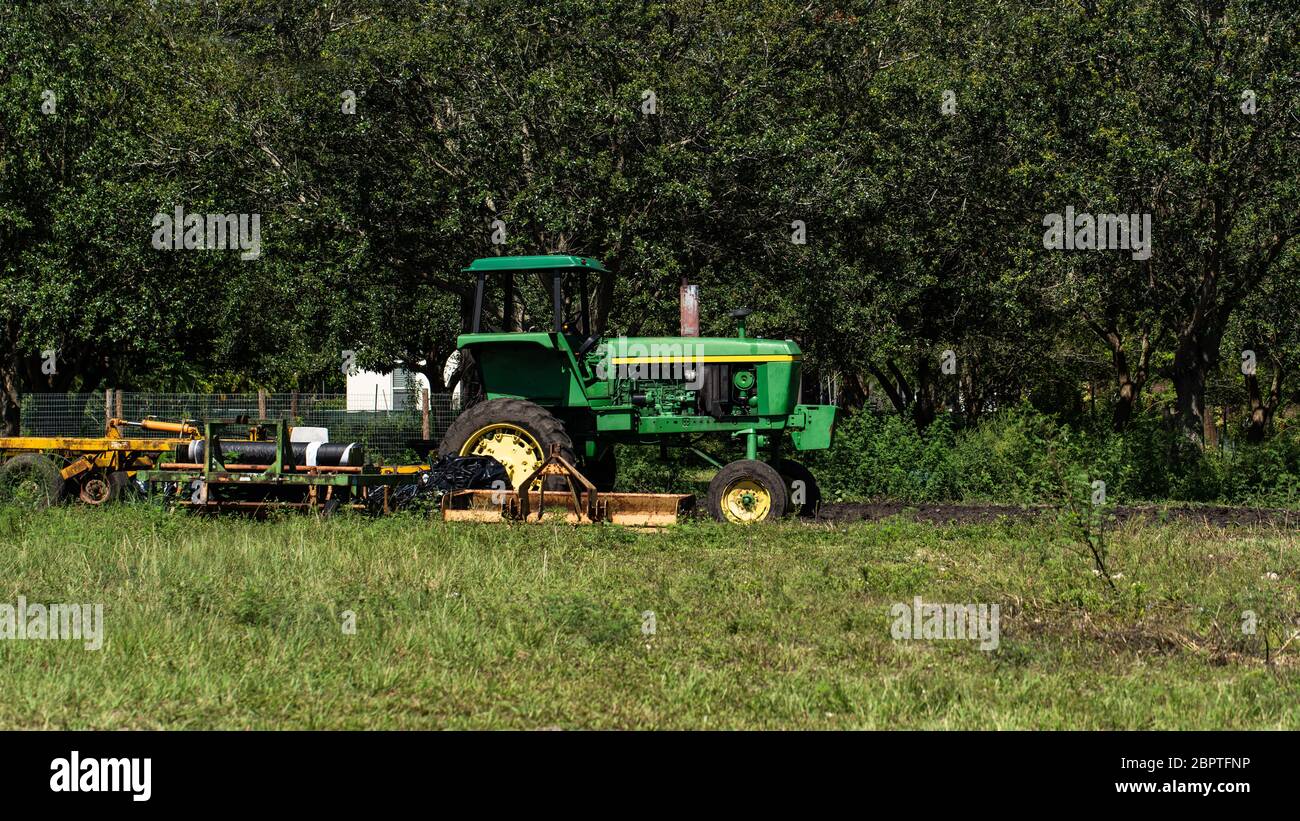 Green tractor on the farm Stock Photo - Alamy