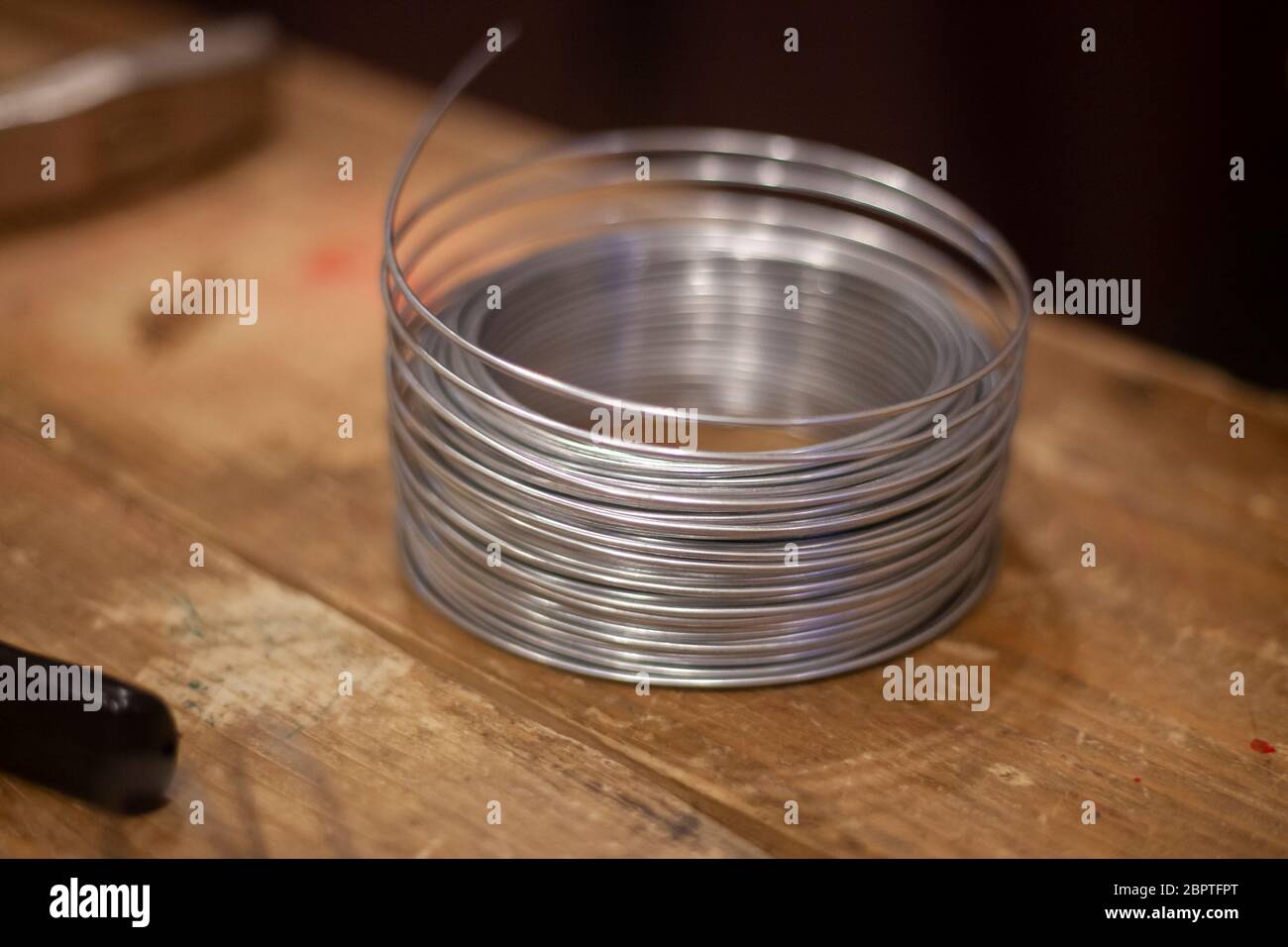 Coil with wire. Alloy for solder. Fastener made of durable steel thread ...