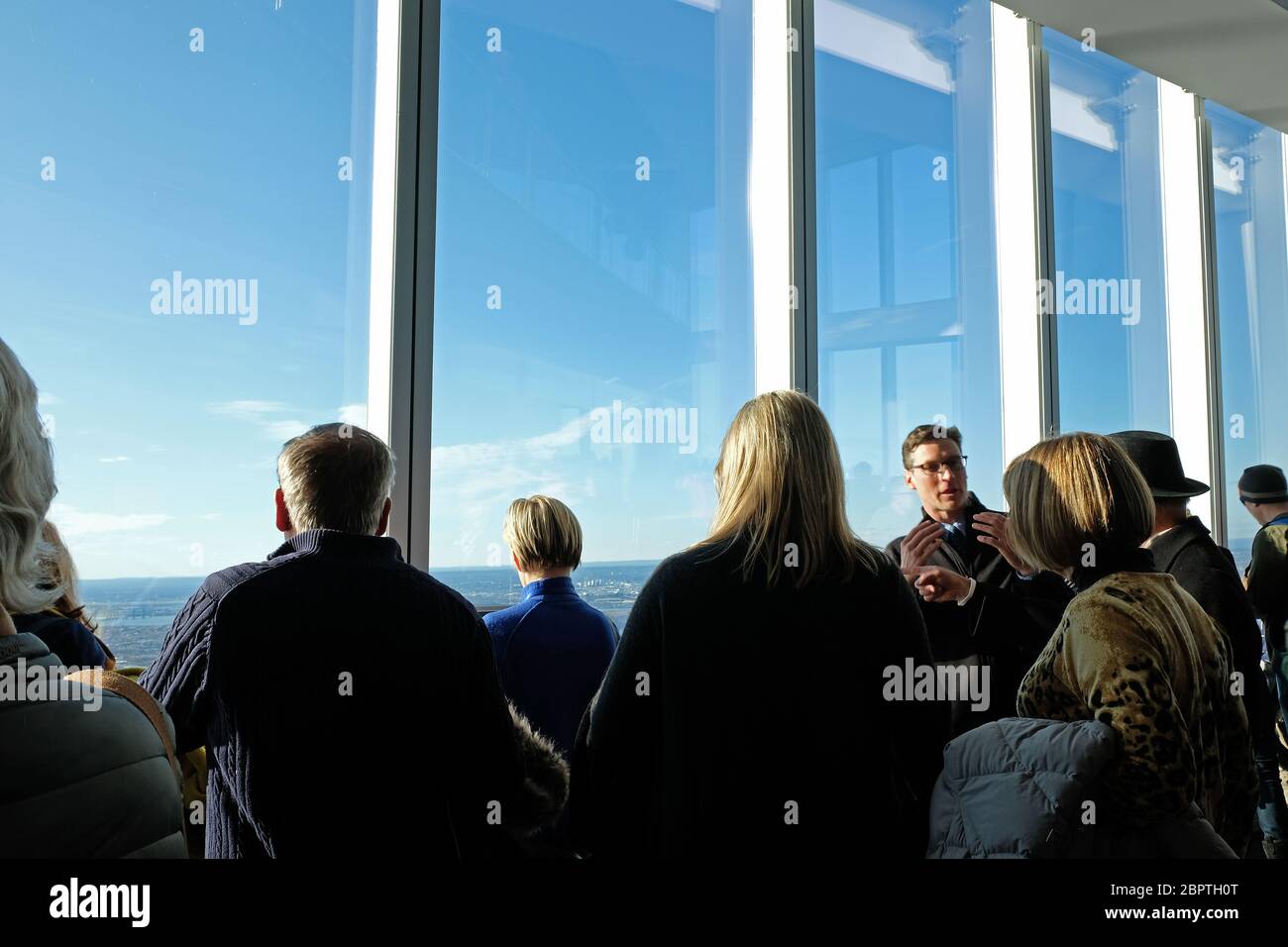 Tour guide with tourists at the top of The Freedom Tower, World Trade ...