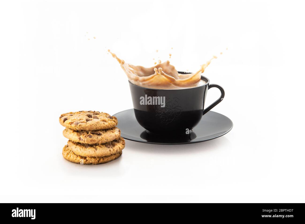 cup of splashing coffee isolated on white background Stock Photo - Alamy