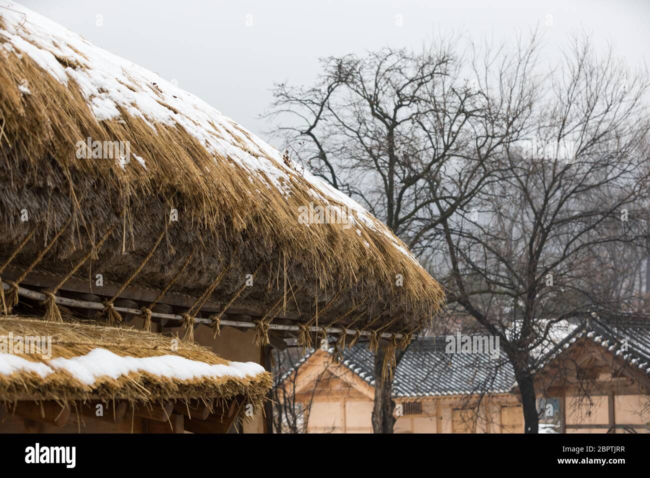 Winter in Korea, snowy traditional village landscape, Oeam folk village ...