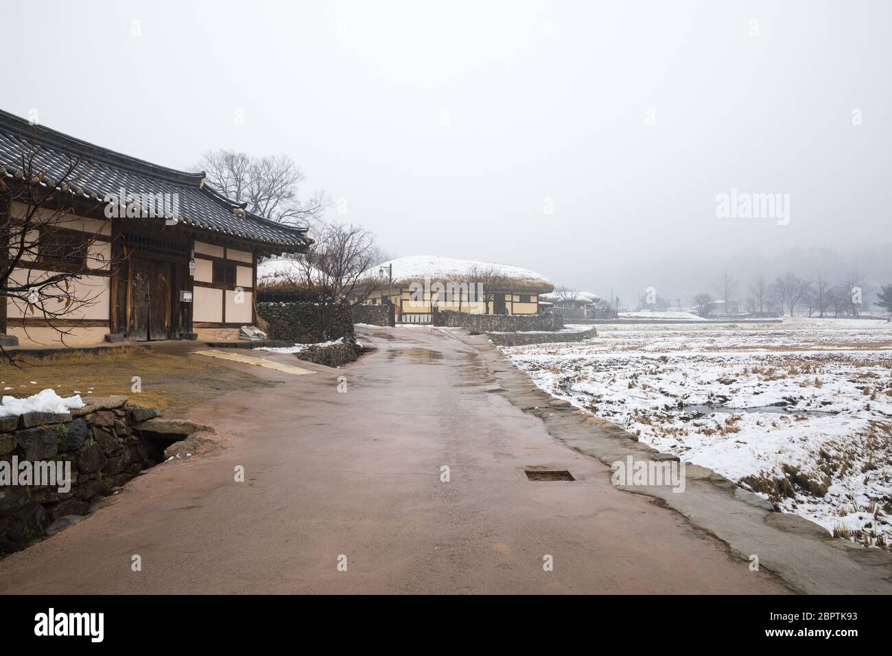 Winter in Korea, snowy traditional village landscape, Oeam folk village ...