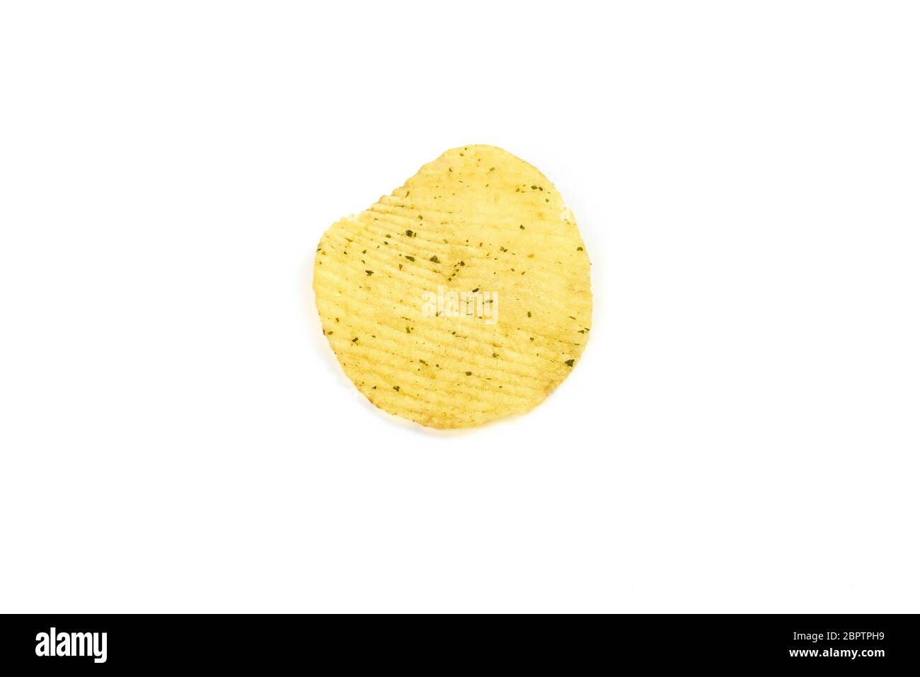 yellow crispy ridged potato chips on white background Stock Photo - Alamy