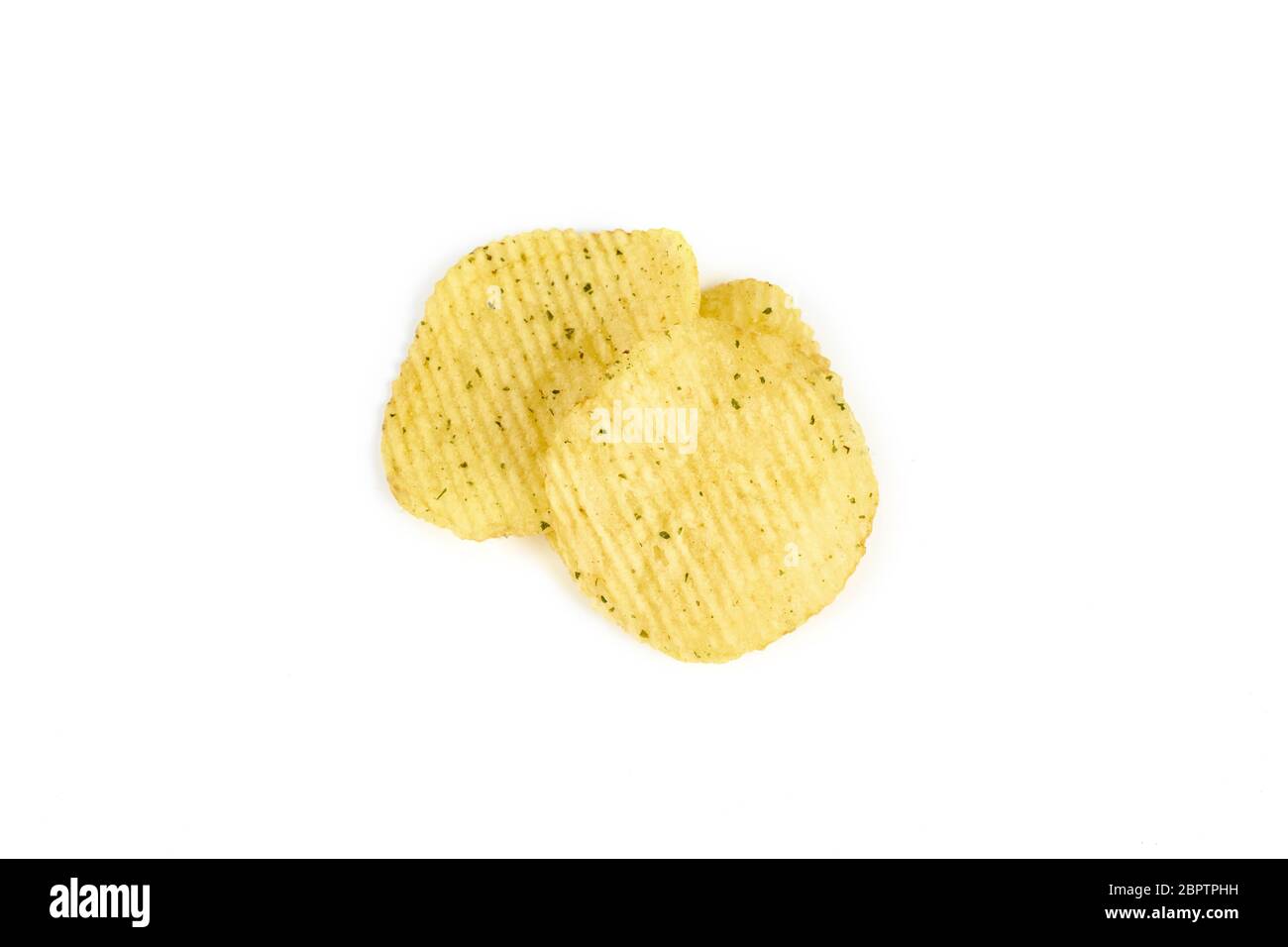 yellow crispy ridged potato chips on white background Stock Photo - Alamy