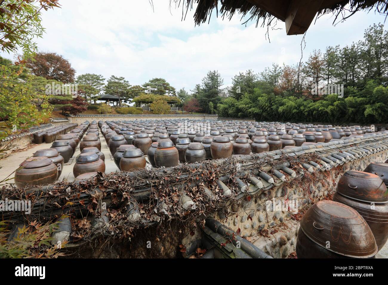Korean traditional clay pot and stone wall Stock Photo - Alamy