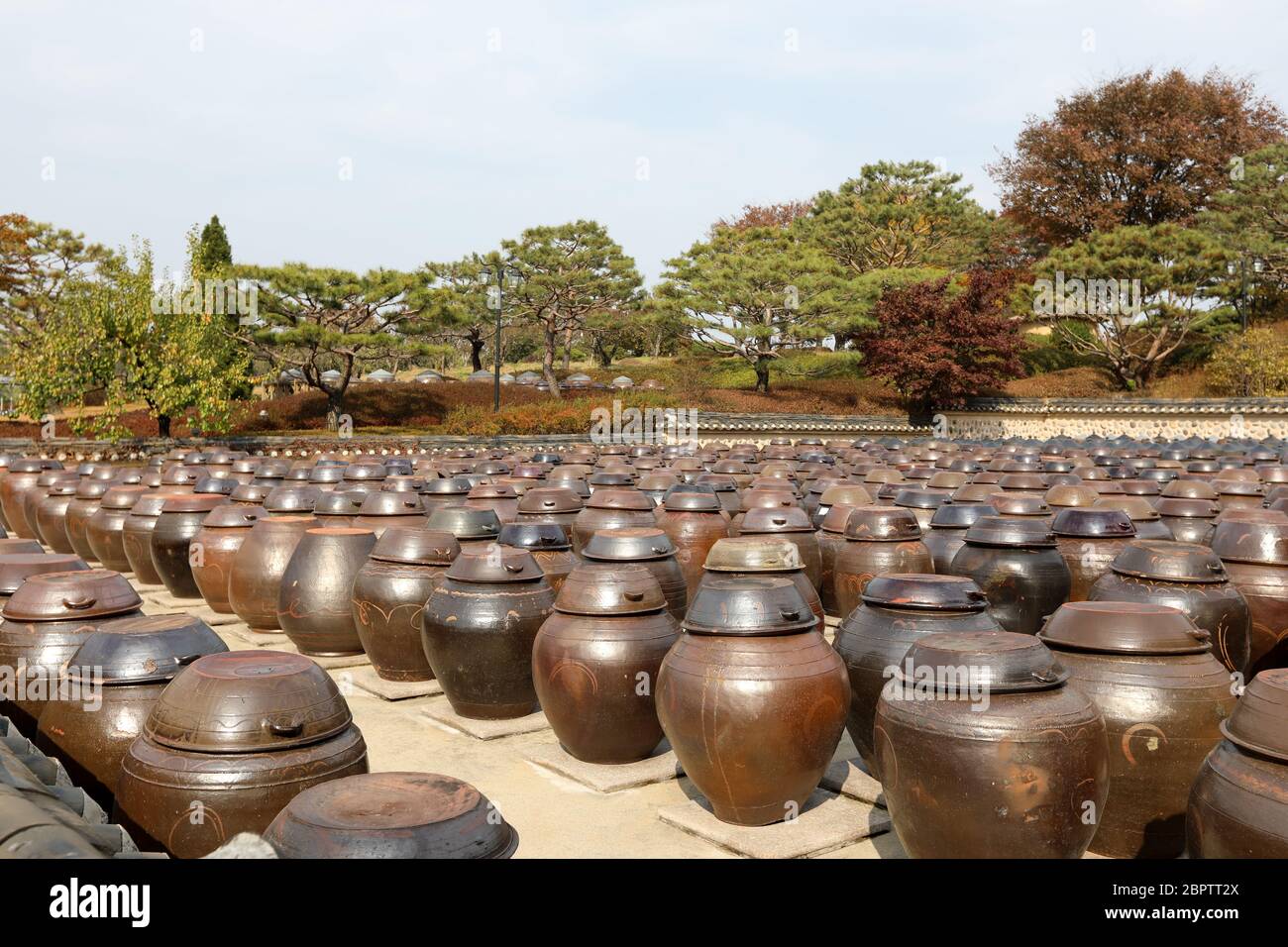 Korean traditional clay pot and stone wall Stock Photo - Alamy
