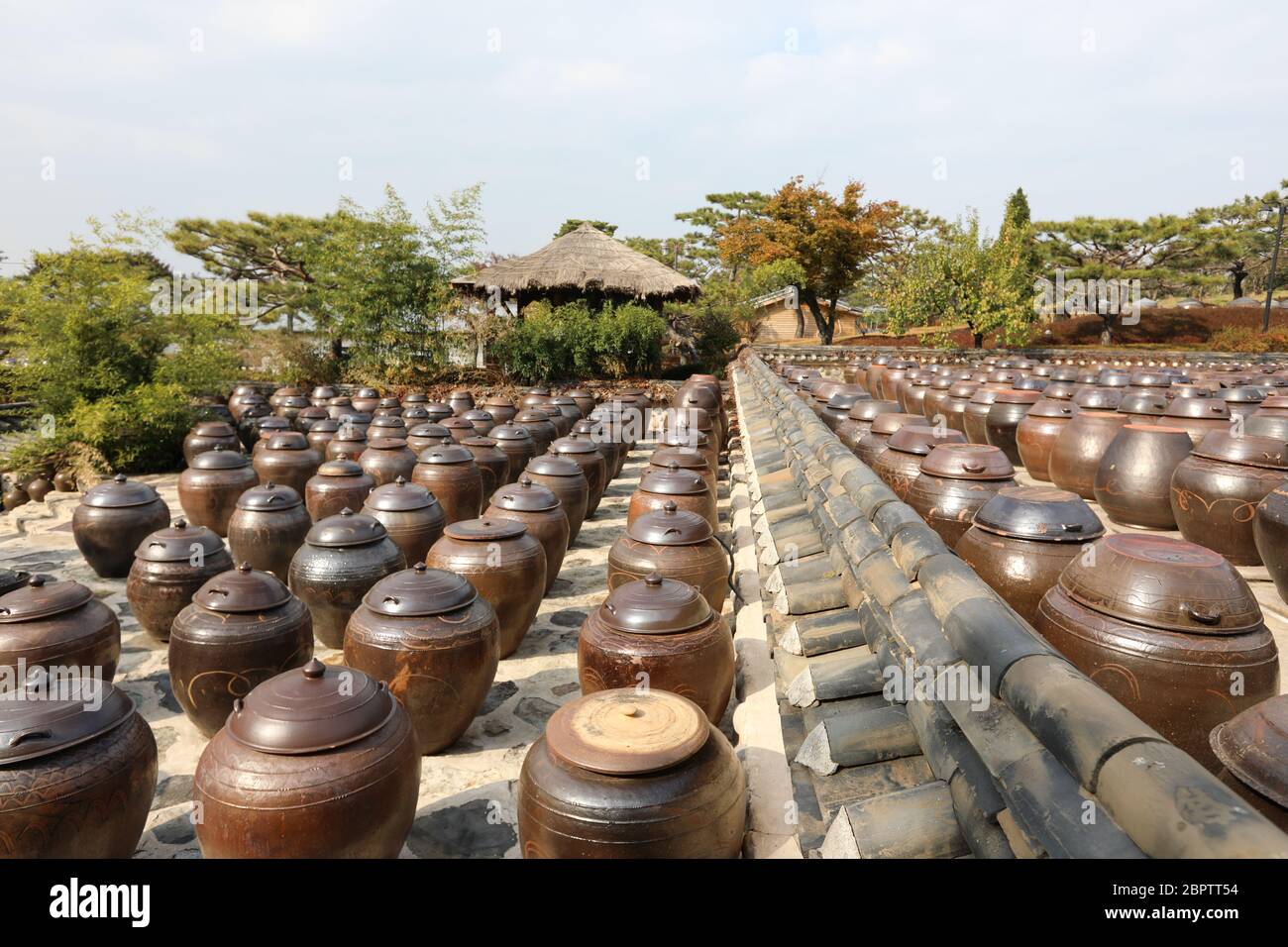 Korean traditional clay pot and stone wall Stock Photo - Alamy