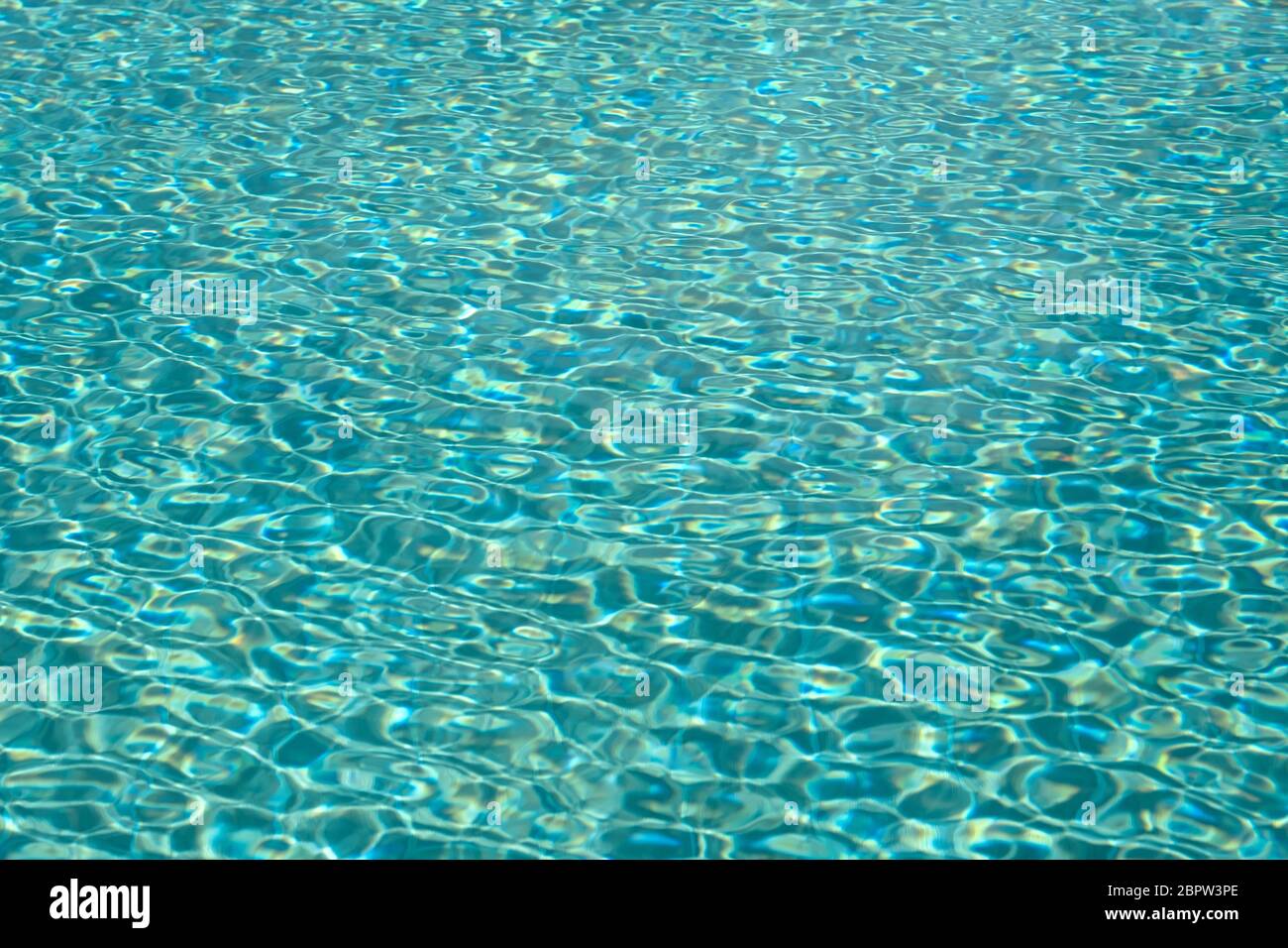 Clear water in swimming pool on sunny day Stock Photo - Alamy