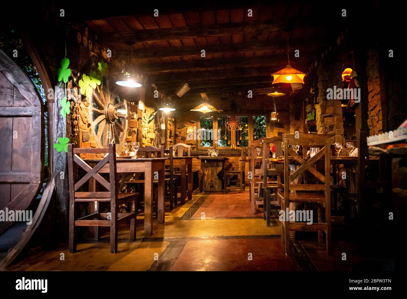 Interior of a beautiful and cozy irish pub, full of drinks, beers and ...
