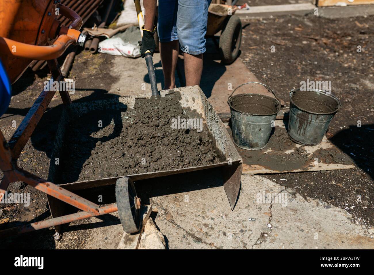 Work with cement mortar, pouring cement mortar wall, foundation and ...
