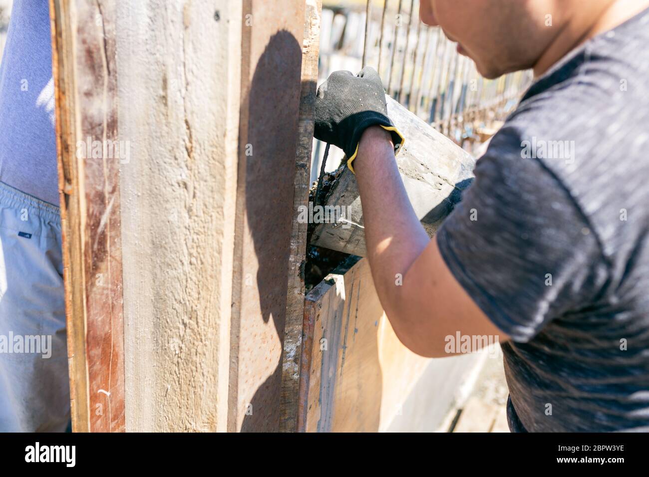 Work with cement mortar, pouring cement mortar wall, foundation and ...