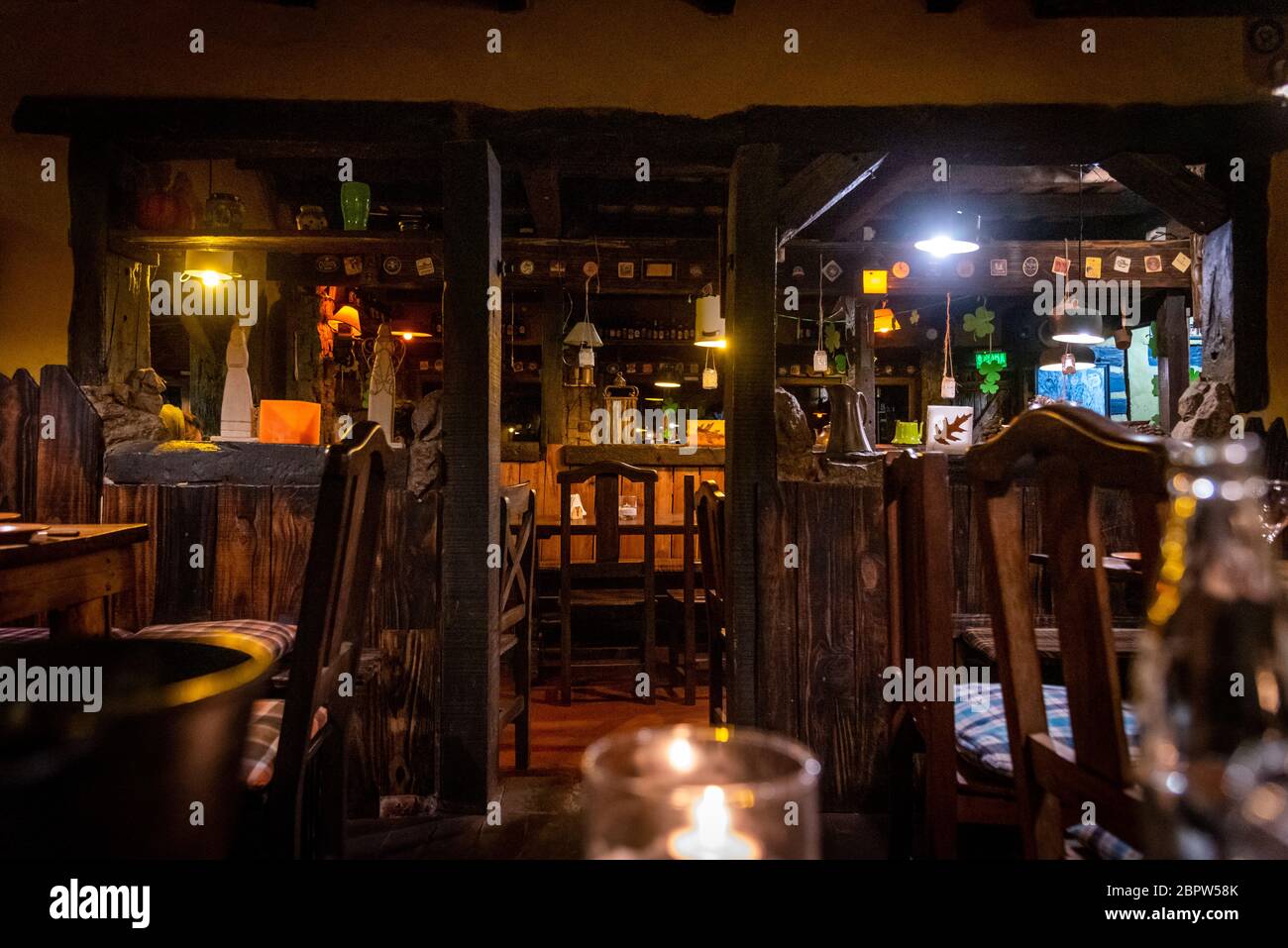 Interior of a beautiful and cozy irish pub, full of drinks, beers and ...