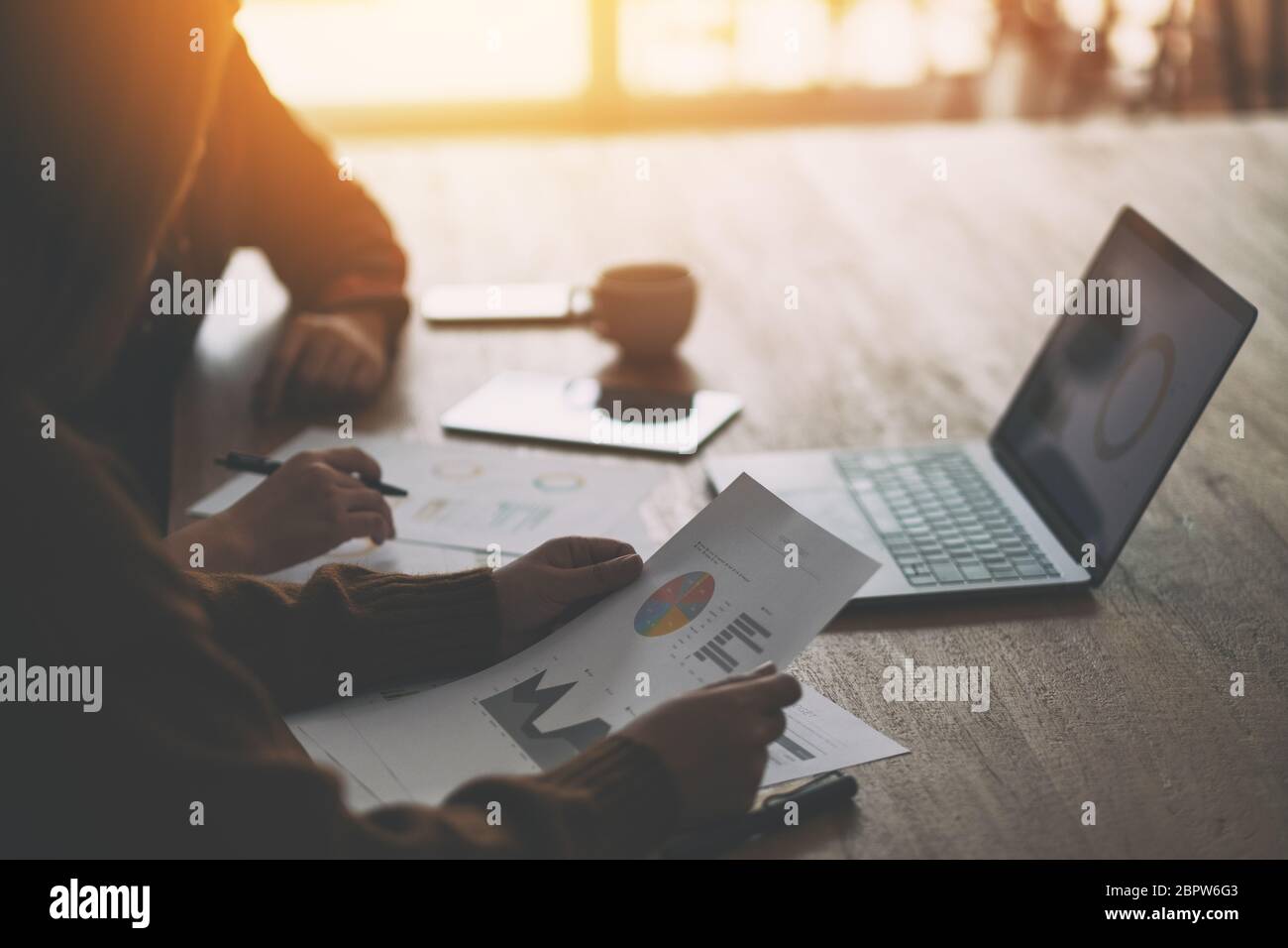 Three businessman working and discussing business together in a meeting ...