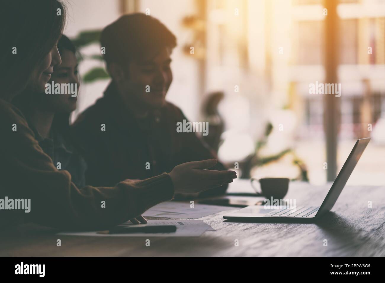 Three businessman working and discussing business together in a meeting ...