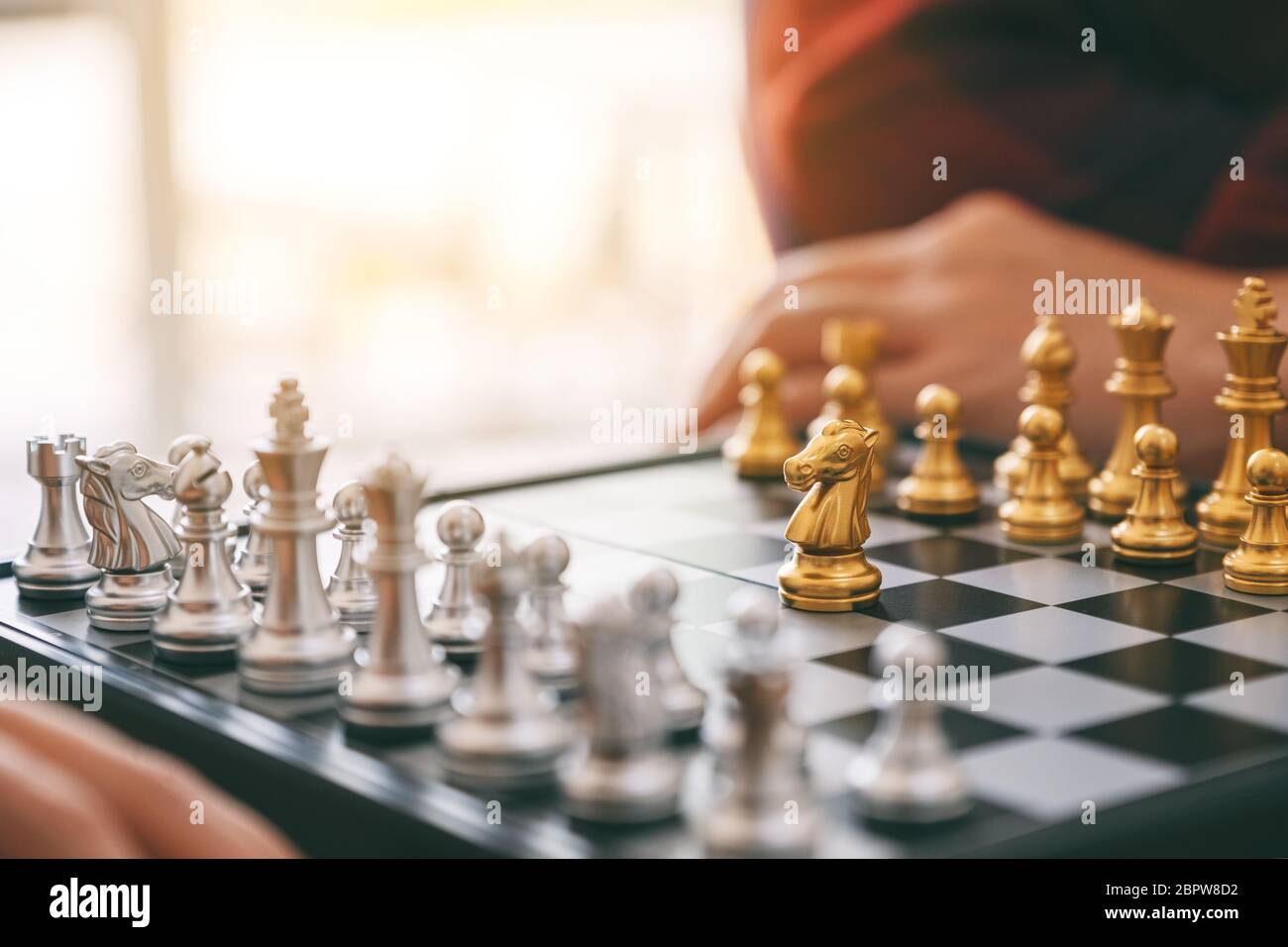 Closeup image of people playing chessboard game together Stock Photo ...