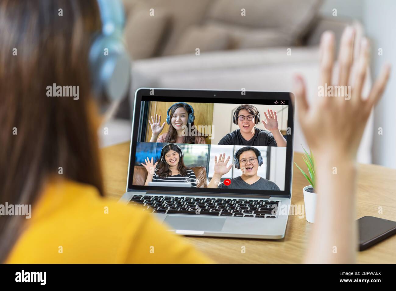 Rear View of Asian Business woman say hello with teamwork colleague in ...