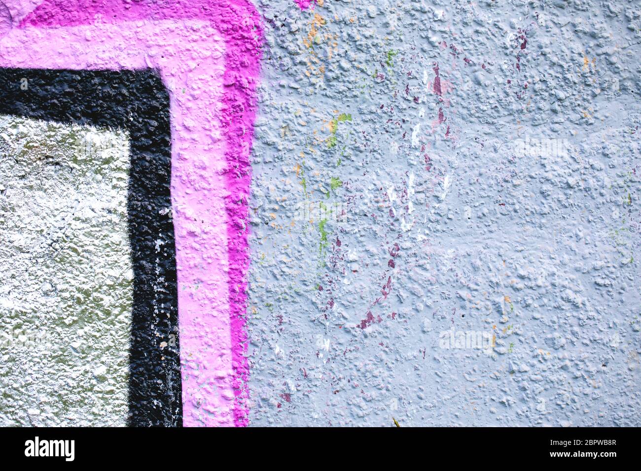 Closeup of colorful urban wall texture. Modern pattern for wallpaper design. Creative urban city ...