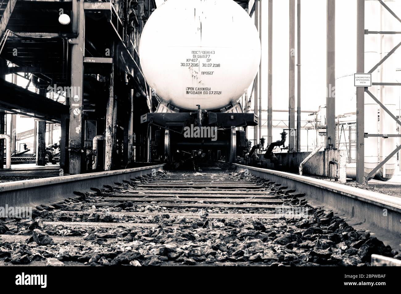 Oil train wagons on oil refinery Stock Photo - Alamy