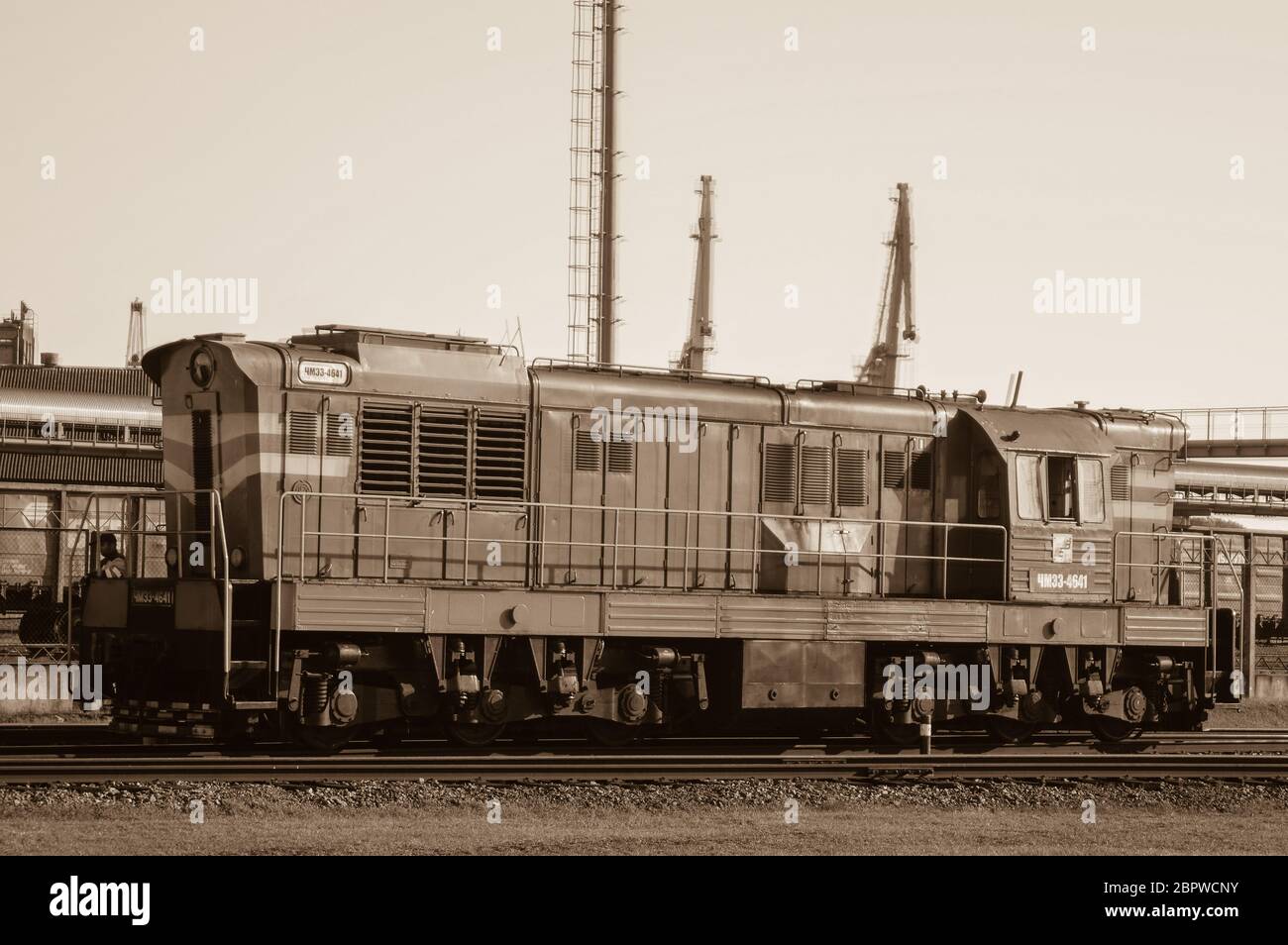 Oil train wagons on oil refinery Stock Photo - Alamy