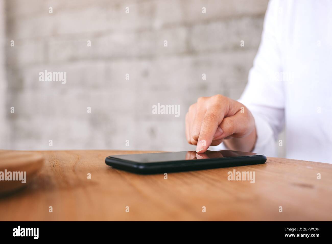 Grabbing cellphone hi-res stock photography and images - Alamy