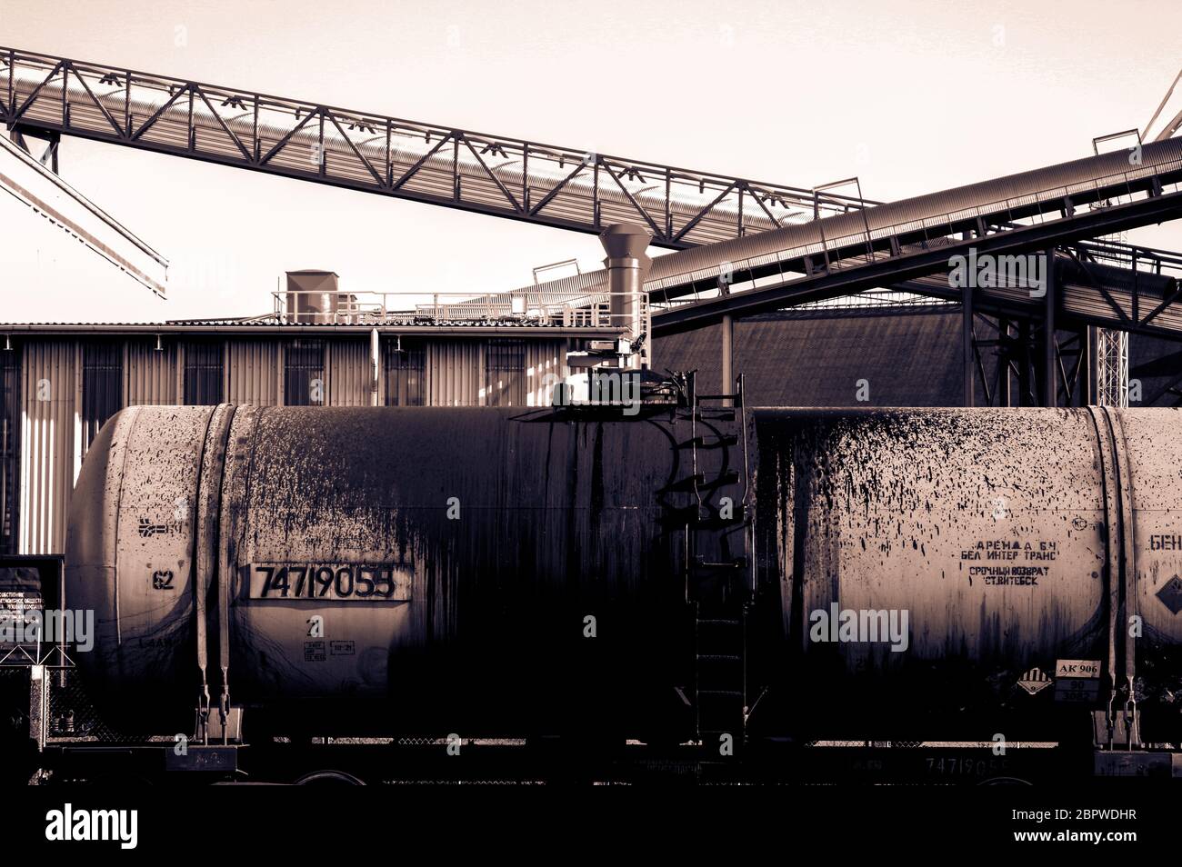 Oil train wagons on oil refinery Stock Photo - Alamy