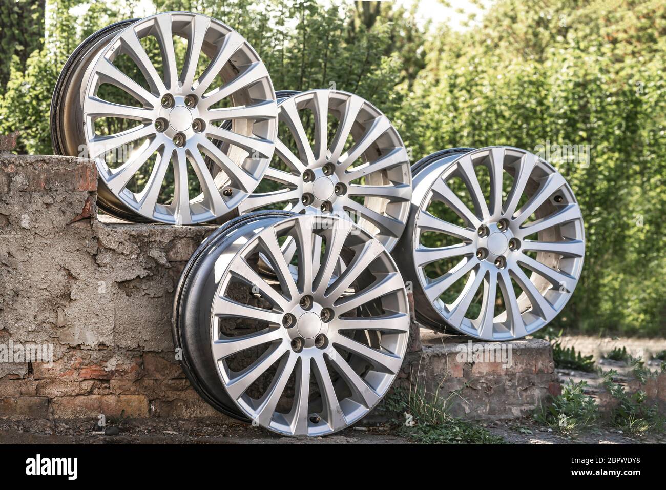 A set of used aluminum alloy wheels, photos from the outside Stock ...