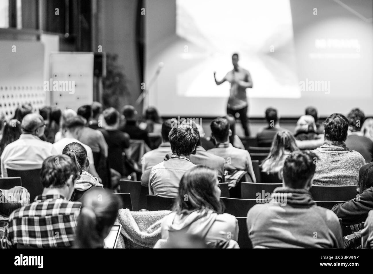 Business speaker giving a talk at business conference event Stock Photo ...