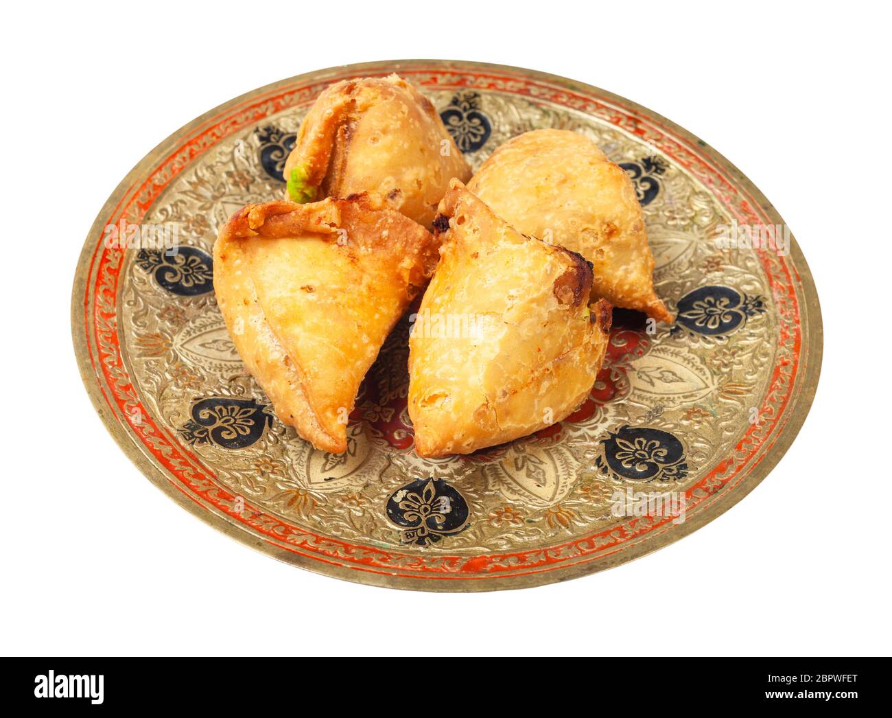 Indian cuisine - portion of vegetable samosas (fried savoury pastry ...