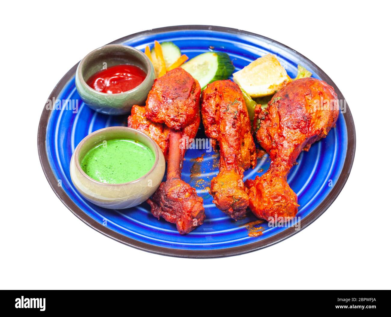 Indian tandoori leg chicken spices Cut Out Stock Images & Pictures - Alamy