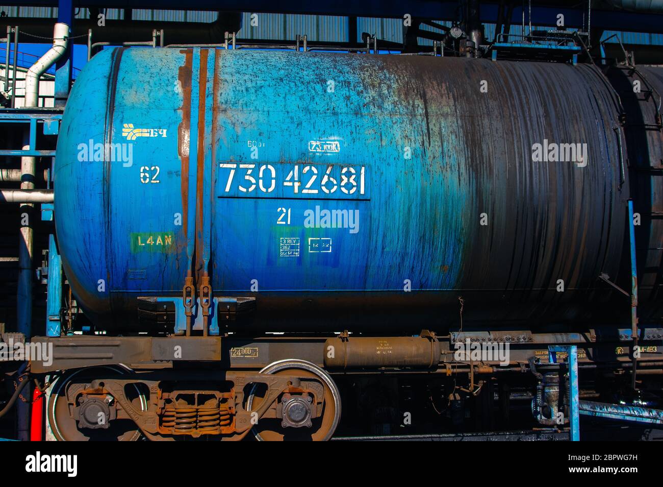 Oil train wagons on oil refinery Stock Photo - Alamy