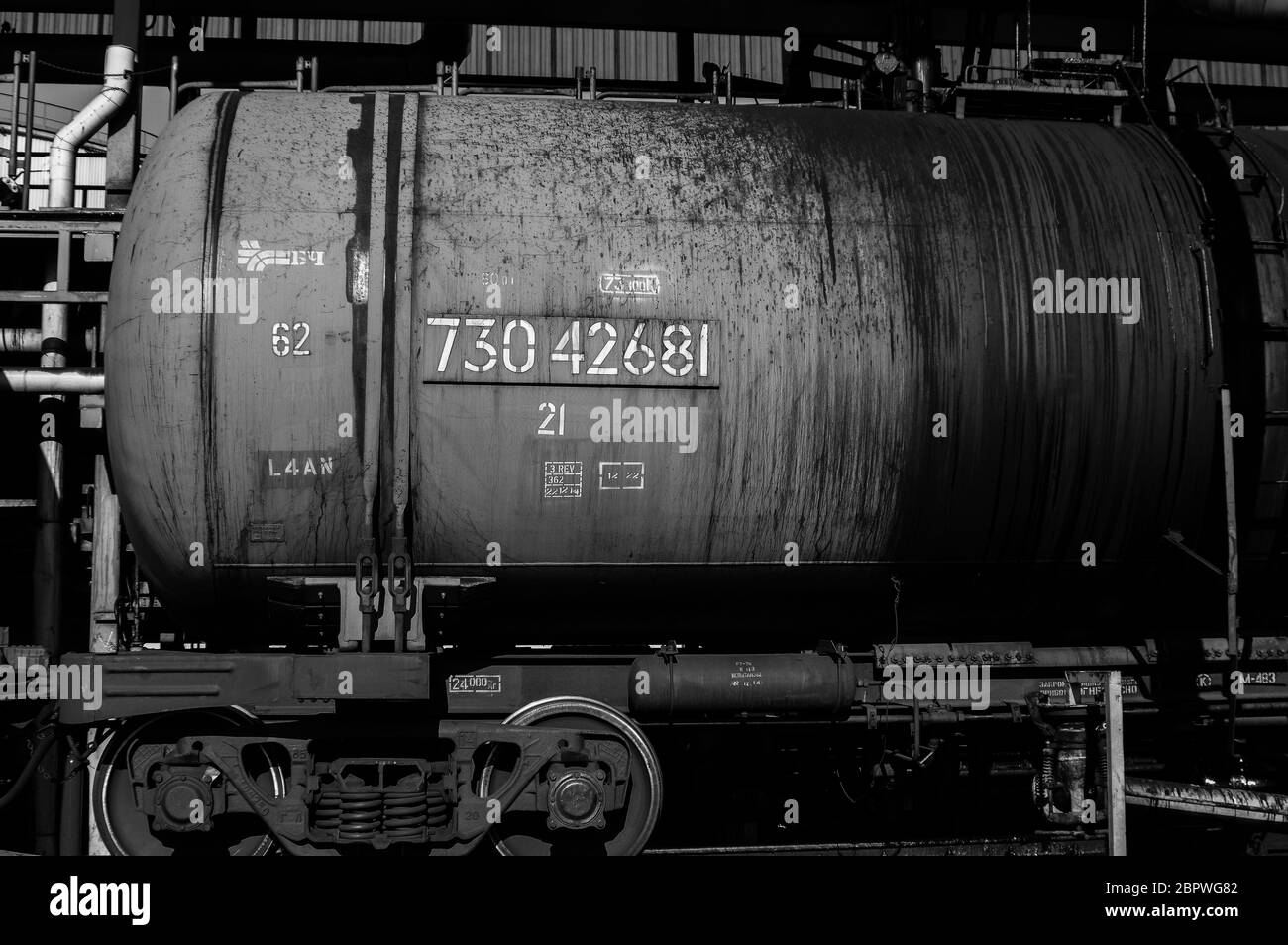 Oil train wagons on oil refinery Stock Photo - Alamy