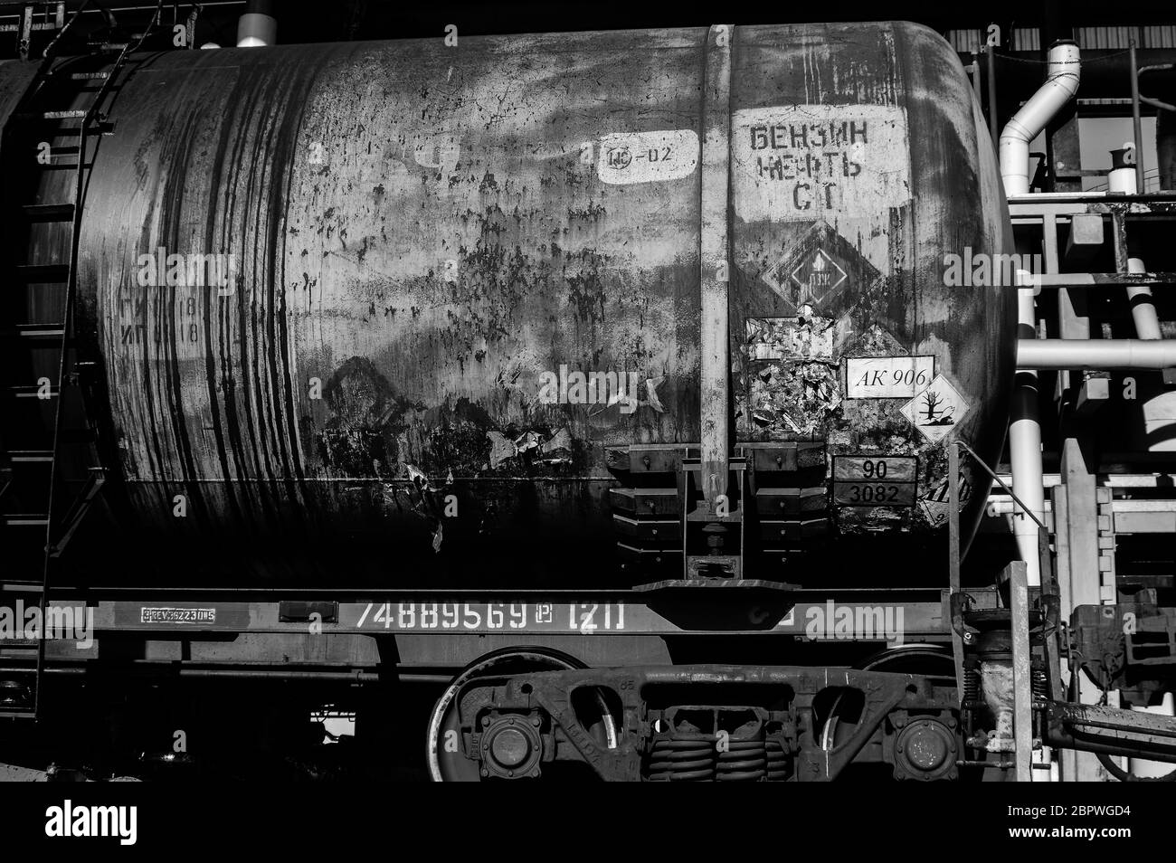 Oil train wagons on oil refinery Stock Photo - Alamy