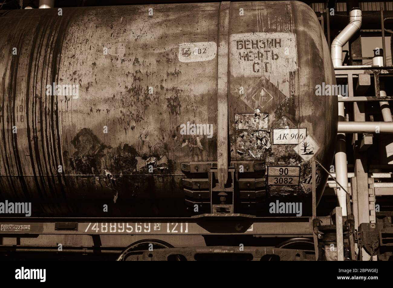 Oil train wagons on oil refinery Stock Photo - Alamy