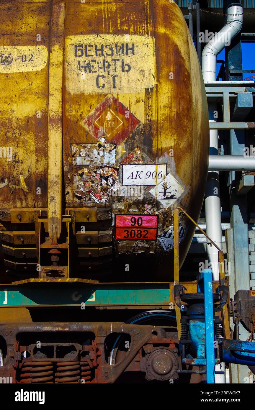 Oil train wagons on oil refinery Stock Photo - Alamy