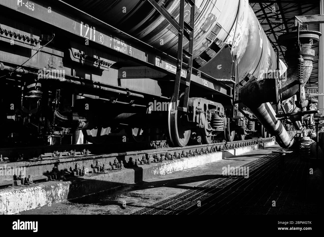 Oil train wagons on oil refinery Stock Photo - Alamy