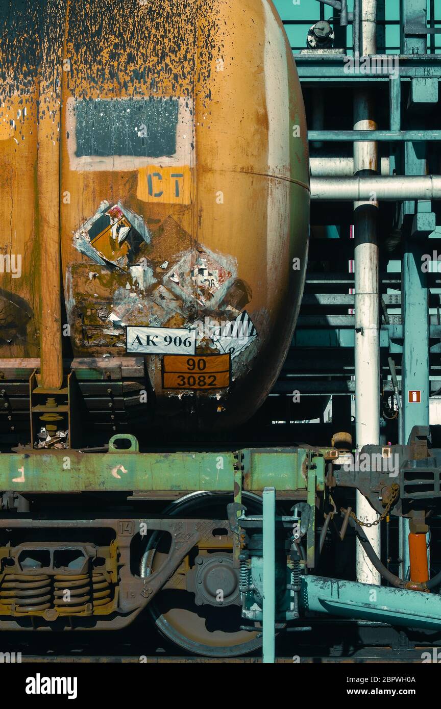 Oil train wagons on oil refinery Stock Photo - Alamy