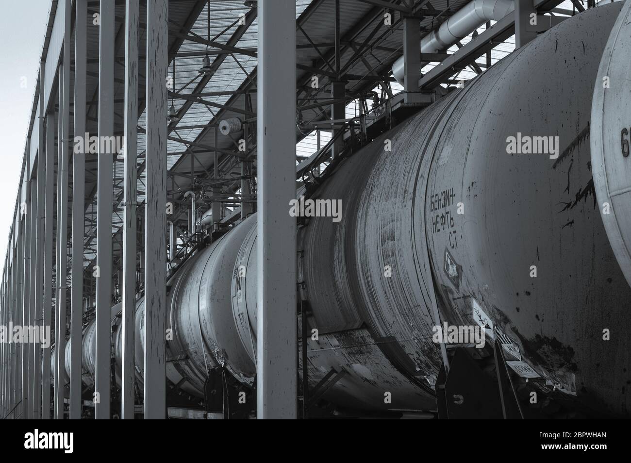 Oil train wagons on oil refinery Stock Photo - Alamy