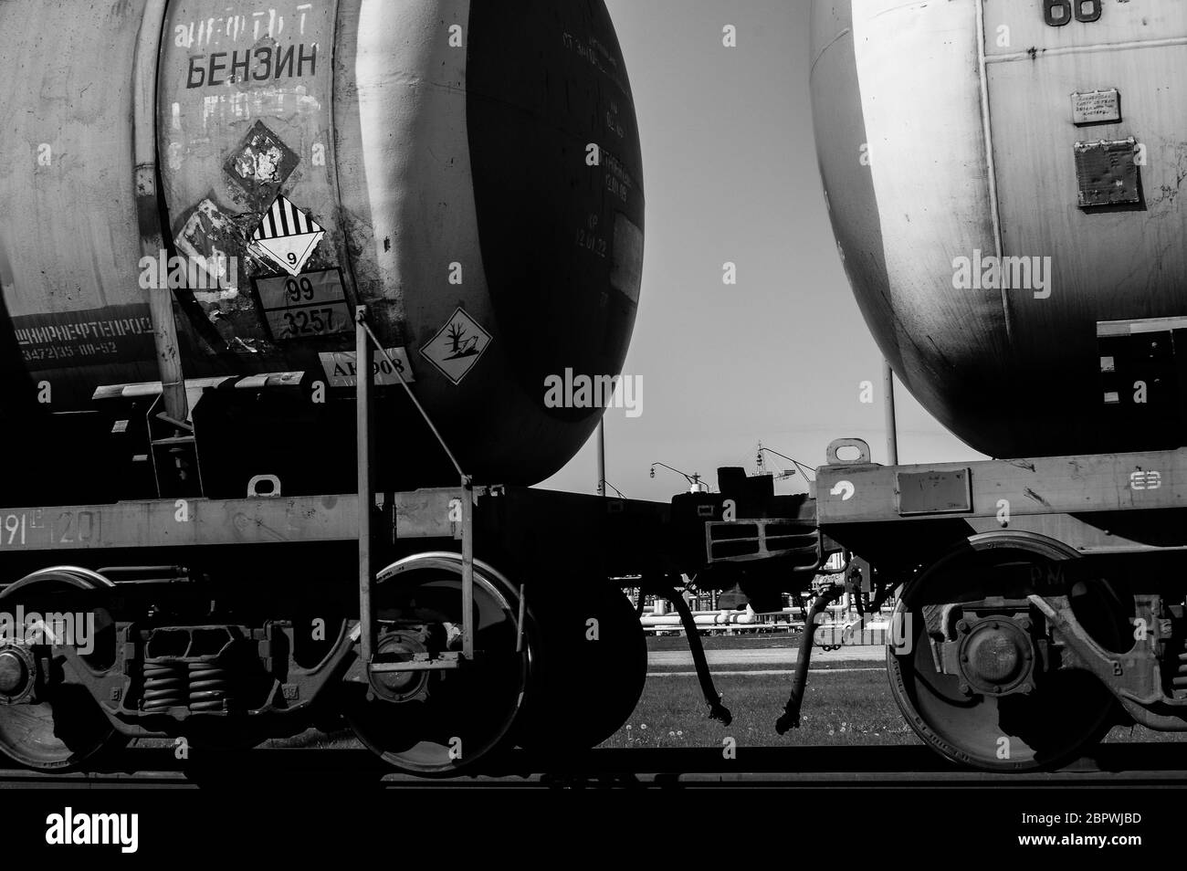 Oil train wagons on oil refinery Stock Photo - Alamy