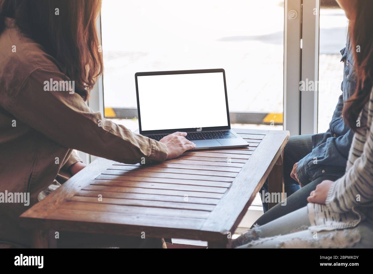 Group people watching computer screen hi-res stock photography and ...