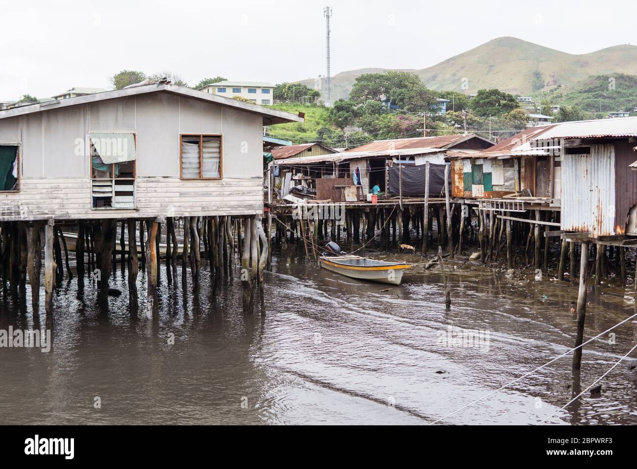 Port Moresby / Papua New Guinea: Wooden houses over the water in ...