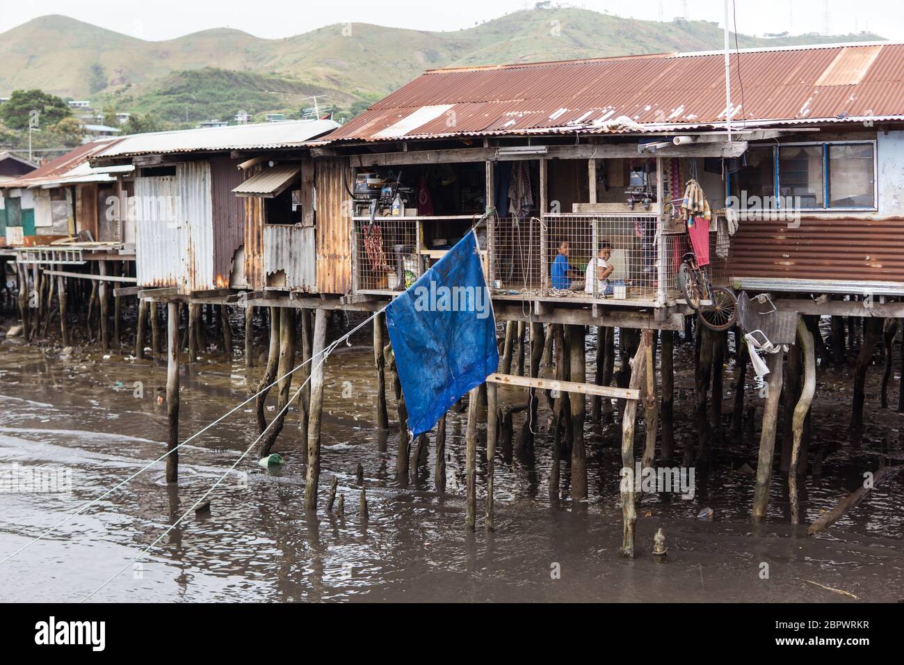 Port Moresby / Papua New Guinea: Wooden houses over the water in ...
