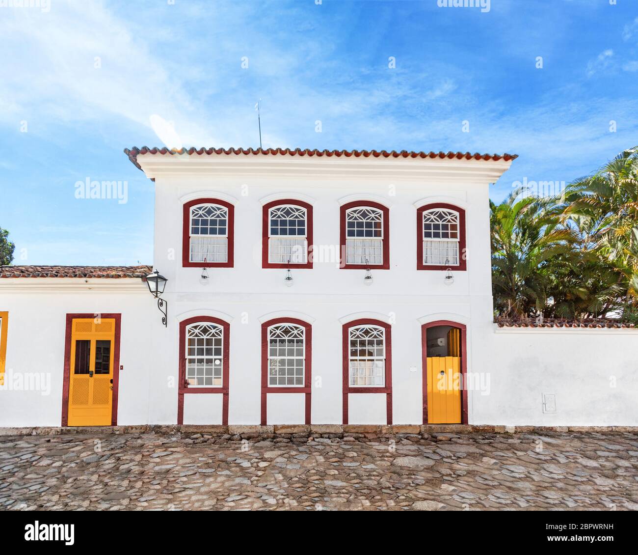 Street and old portuguese colonial houses in historic downtown in ...